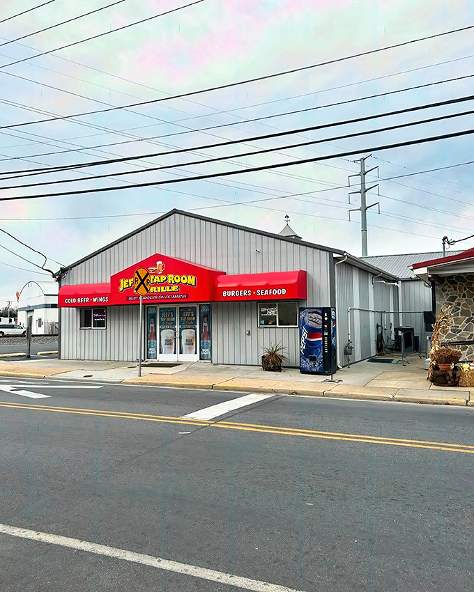 The bold red awning of Jeff's Taproom & Grille promises "BEER • WINGS" but delivers so much more. Small-town Delaware dining at its unpretentious best.