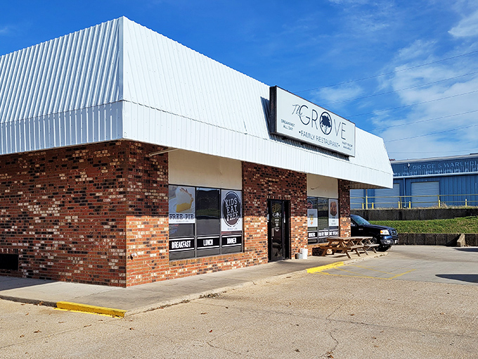 The unassuming brick facade of The Grove Family Restaurant hides culinary treasures within. That "FREE PIE" sign isn't just decoration—it's a promise of sweet things to come.