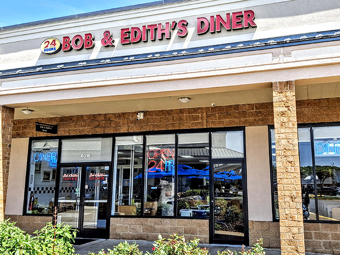 The glowing "OPEN 24 HR" sign isn't just illumination—it's a beacon of hope for night owls and early birds alike at Bob & Edith's Diner.