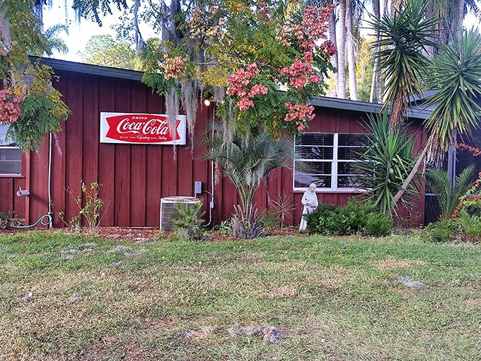 The stone facade and green shingled roof welcome you like an old friend – rustic charm that promises something more authentic than your average roadside eatery.