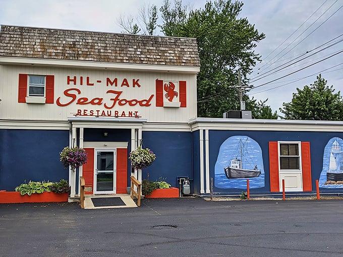 The blue and red exterior of Hil-Mak beckons like a nautical mirage in Ohio, complete with charming fishing boat mural that whispers, "Yes, we know our seafood."