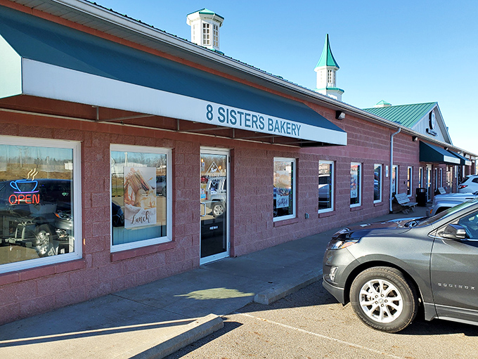 The pink building that houses 8 Sisters Bakery stands like a beacon of sweetness in Mt. Gilead, promising delicious treasures within.
