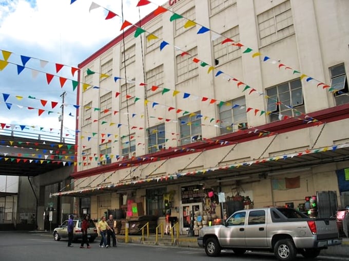 Those colorful flags aren't celebrating a grand opening – they're just Tuesday at Portland's most wonderfully chaotic treasure hunt.