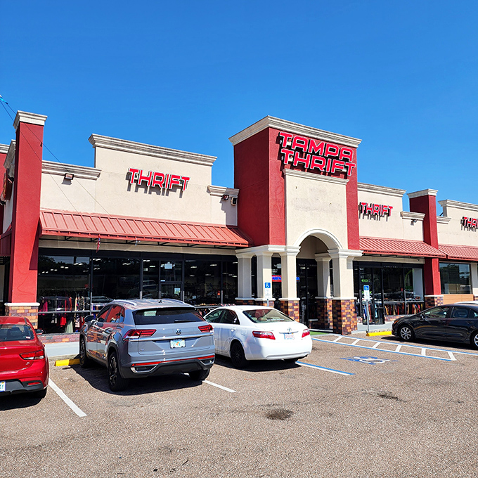 The red-and-cream exterior of Tampa Thrift beckons like a fashion oasis in the Florida sun. Treasure hunters, your destination awaits!
