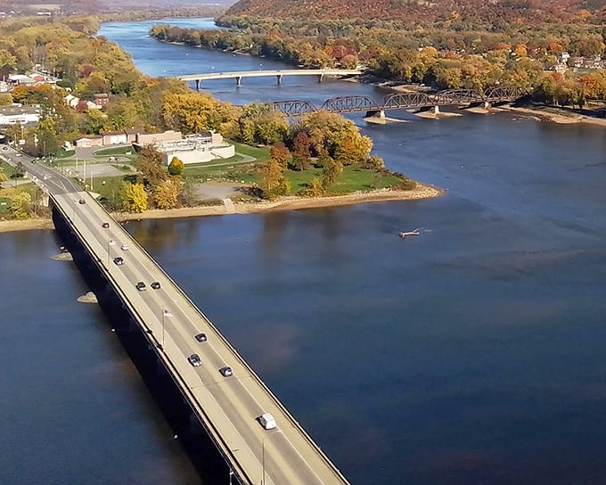 The perfect confluence of natural wonders – where the West and North branches of the Susquehanna River meet, creating a postcard-worthy panorama that no filter could improve.