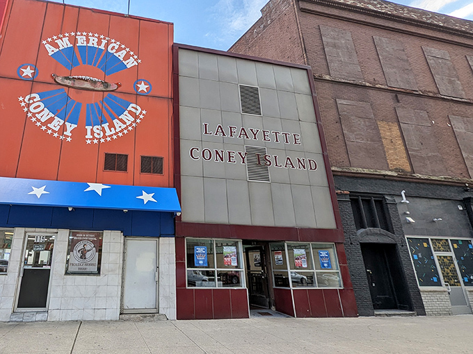 The iconic facade of Lafayette Coney Island stands proudly next to its longtime rival, American Coney Island. Detroit's greatest food rivalry continues daily on this downtown corner. 