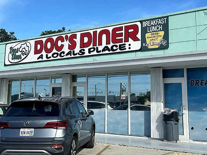 The unassuming exterior of Doc's Diner proudly declares itself "A LOCALS PLACE" – the universal sign that you've stumbled upon culinary gold in Key Largo.