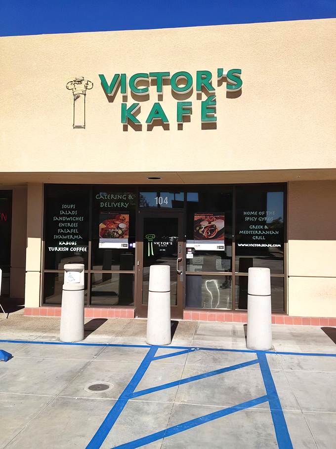 The unassuming yellow exterior of Victor's Kafé hides culinary treasures within, proving once again that strip mall gems are California's best-kept secrets.