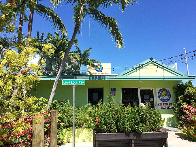 A slice of paradise painted lime green! The Blond Giraffe's charming exterior on Love Lock Way practically screams "Florida Keys" with its tropical landscaping and inviting vibe.