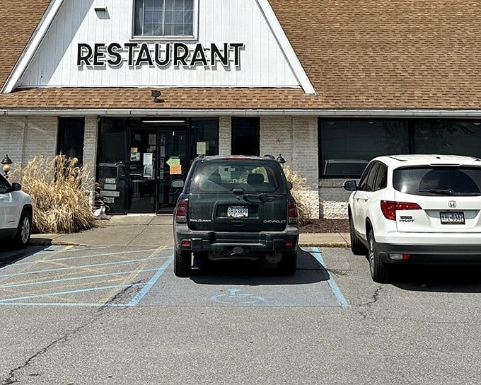 The unassuming exterior of The Cottage Family Restaurant speaks volumes—like that quiet classmate who turned out to be the valedictorian, it's hiding greatness behind that modest façade.