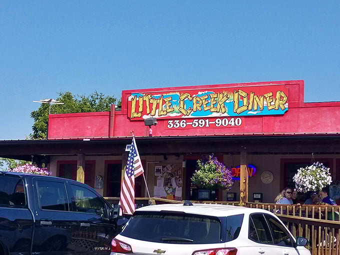 The unassuming exterior of Little Creek Diner proves once again that culinary greatness rarely comes with neon signs and valet parking.