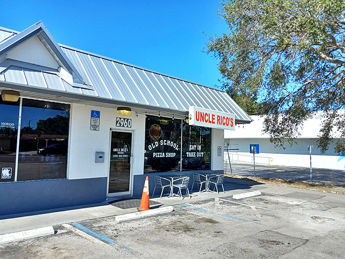 This unassuming Fort Myers storefront hides pizza perfection behind its humble metal roof and simple signage.