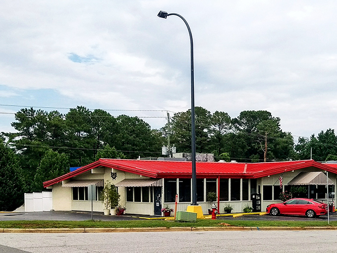 That iconic red roof isn't just eye-catching—it's a beacon calling to seafood lovers across Raleigh like a maritime lighthouse for hungry landlubbers.