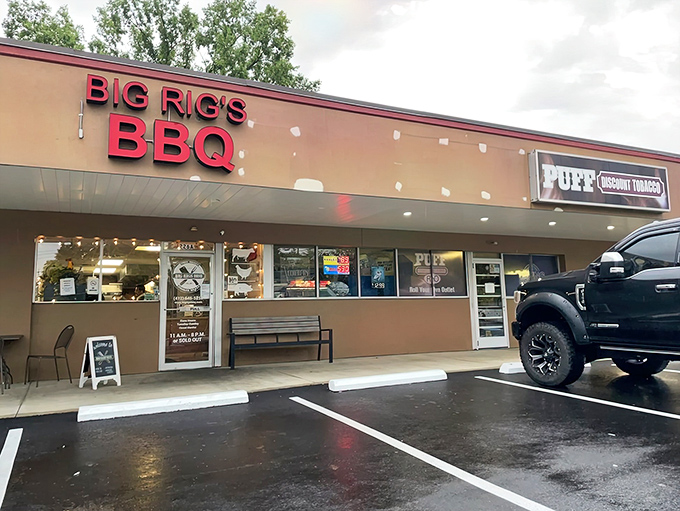 The bright red sign of Big Rig's BBQ stands out like a beacon of hope for hungry travelers. No-frills exterior, all thrills inside.