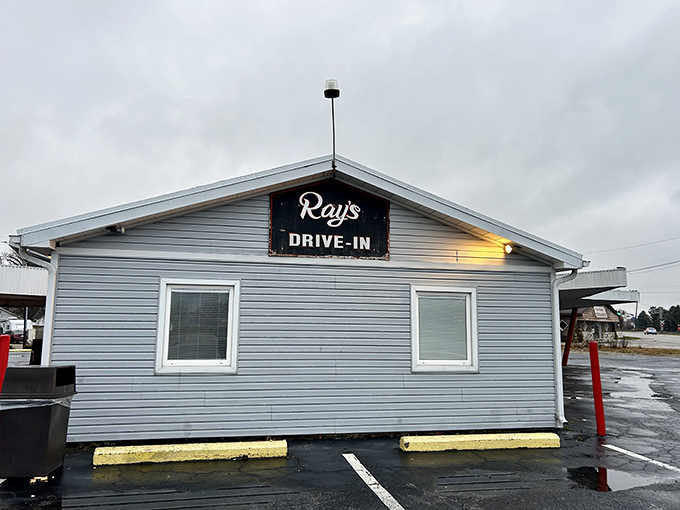 The iconic red-pillared carport at Ray's hasn't changed in decades – proof that when something works perfectly, you don't mess with it.