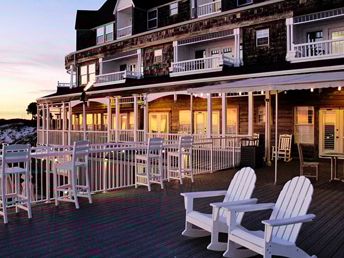 The stone facade of Beach Walk Cafe stands like a coastal castle, palm trees standing guard over this culinary treasure nestled in Destin's sugar-white shores.
