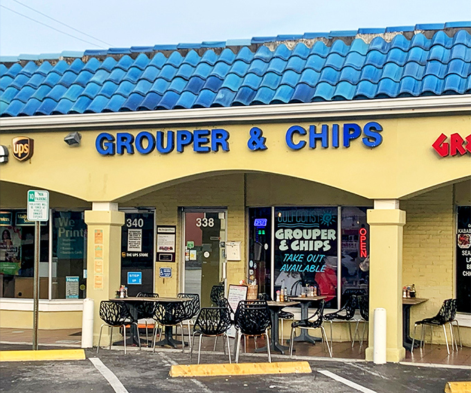 That iconic blue roof and bright yellow facade aren't just eye-catching—they're like a beacon calling seafood lovers home to this Naples treasure.