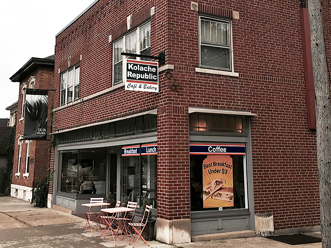 Kolache Republic's vibrant orange sign beckons from the brick facade of The Daily Growler building, like a delicious secret hiding in plain sight.