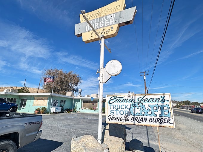 That vintage neon sign isn't just advertising - it's a beacon calling hungry souls home to Route 66 magic.