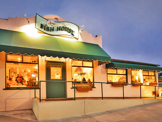 The unassuming pink exterior with a line already forming – proof that the best seafood spots don't need fancy facades, just fantastic food.