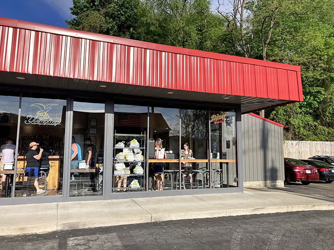 The bright red exterior isn't just eye-catching—it's a smoke signal to barbecue lovers that something special awaits inside this Verona gem.