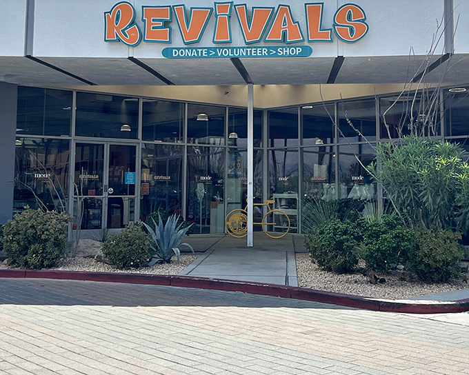 The desert sun highlights Revivals' bold orange signage, where "Donate > Volunteer > Shop" isn't just a slogan—it's a lifestyle philosophy for treasure hunters.