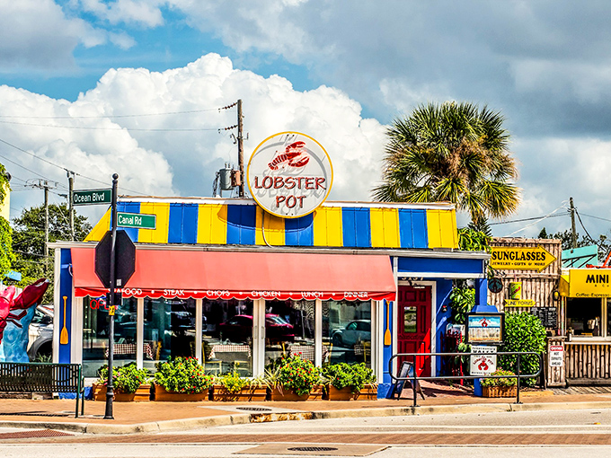 The iconic red awning and circular lobster sign beckon seafood lovers like a lighthouse guides ships home to New England shores. 
