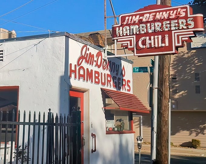 The iconic white exterior with that unmistakable red door is like finding a time capsule in downtown Sacramento—small in size but enormous in character.