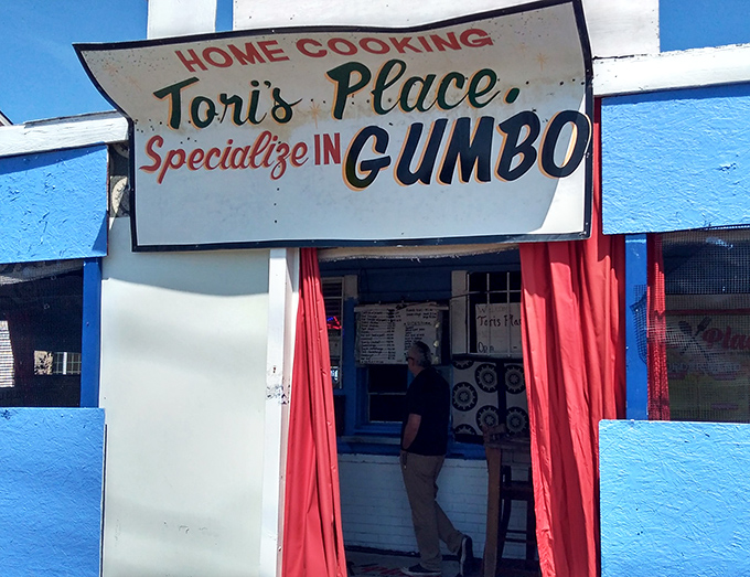 The blue beacon of culinary hope! Tori's Place announces its gumbo specialty with the confidence of someone who knows they've mastered their craft.