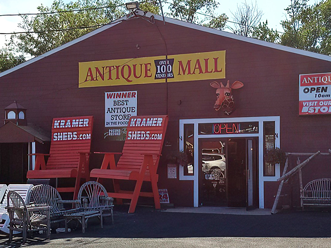The burgundy barn with its whimsical giraffe head and horse statue isn't just quirky curb appeal—it's a siren call to treasure hunters everywhere.