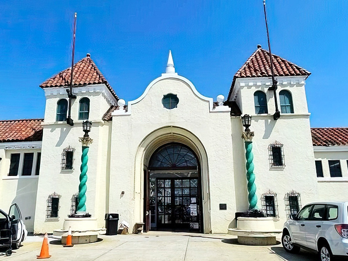 The Spanish Mission-style entrance isn't just photogenic—it's a portal to treasure hunting paradise. Like finding the wardrobe to Narnia, but with vintage vinyl instead of talking lions.