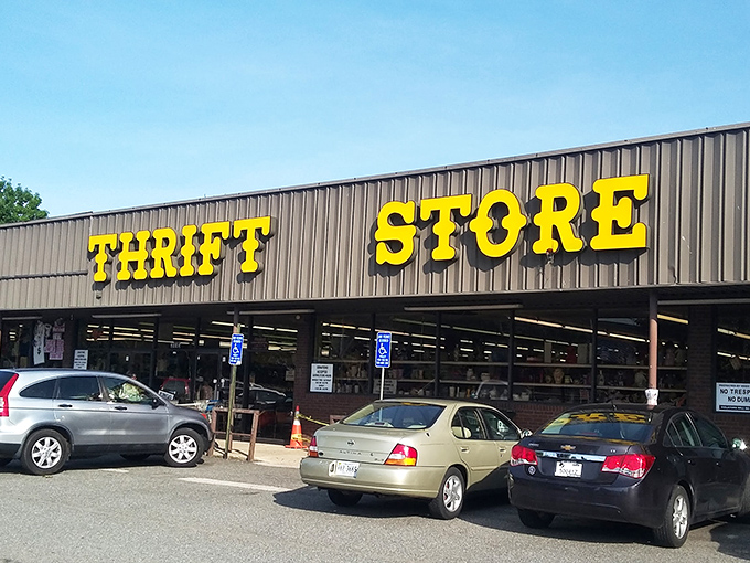 The unassuming exterior of Prime Thrift belies the wonderland of secondhand treasures waiting inside. Bold yellow letters promise adventure.