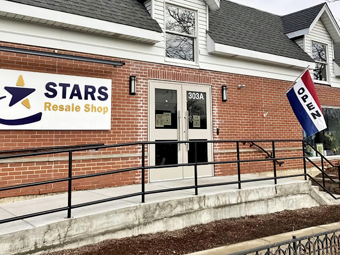 The unassuming brick exterior of Stars Resale Shop hides a treasure trove within. Budget fashion awaits behind those humble doors.