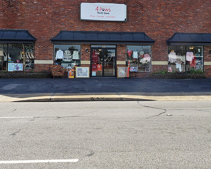 Classic brick storefront charm meets serious thrift hunting – those window displays are just the appetizer.