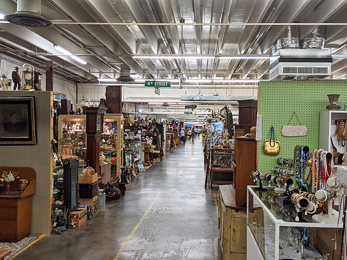The sunshine-yellow exterior isn't subtle, but neither are the treasures inside. Factory Antique Mall announces itself like a vintage Vegas marquee.