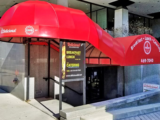That iconic red awning isn't just a splash of color—it's a beacon of hope for hungry downtown Columbus workers seeking sandwich salvation.