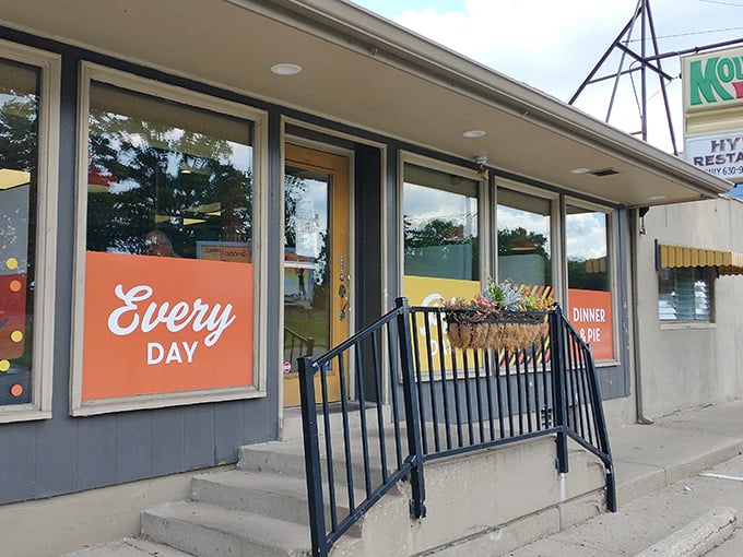 The unassuming exterior of Hyde's Restaurant promises little but delivers everything—bright orange window signs inviting you to enjoy "Dinner & Pie" every day.