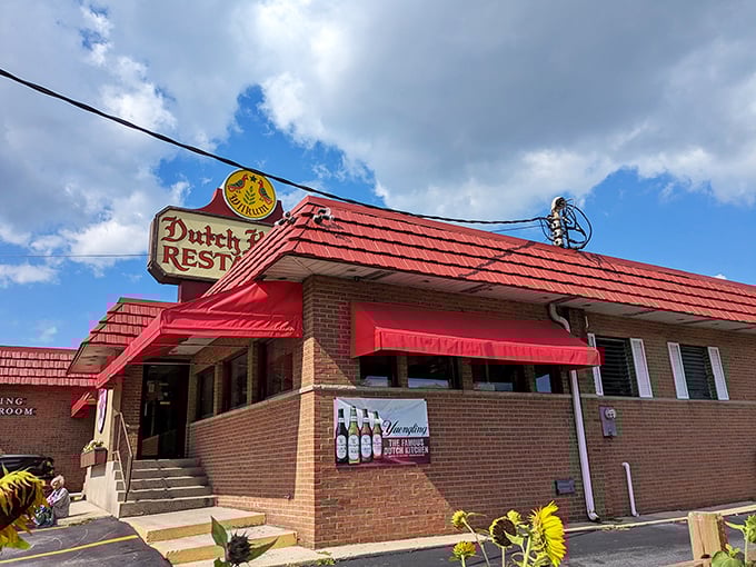 The iconic red-roofed Dutch Kitchen stands proudly along I-81, its vintage sign beckoning hungry travelers like a lighthouse for comfort food enthusiasts.