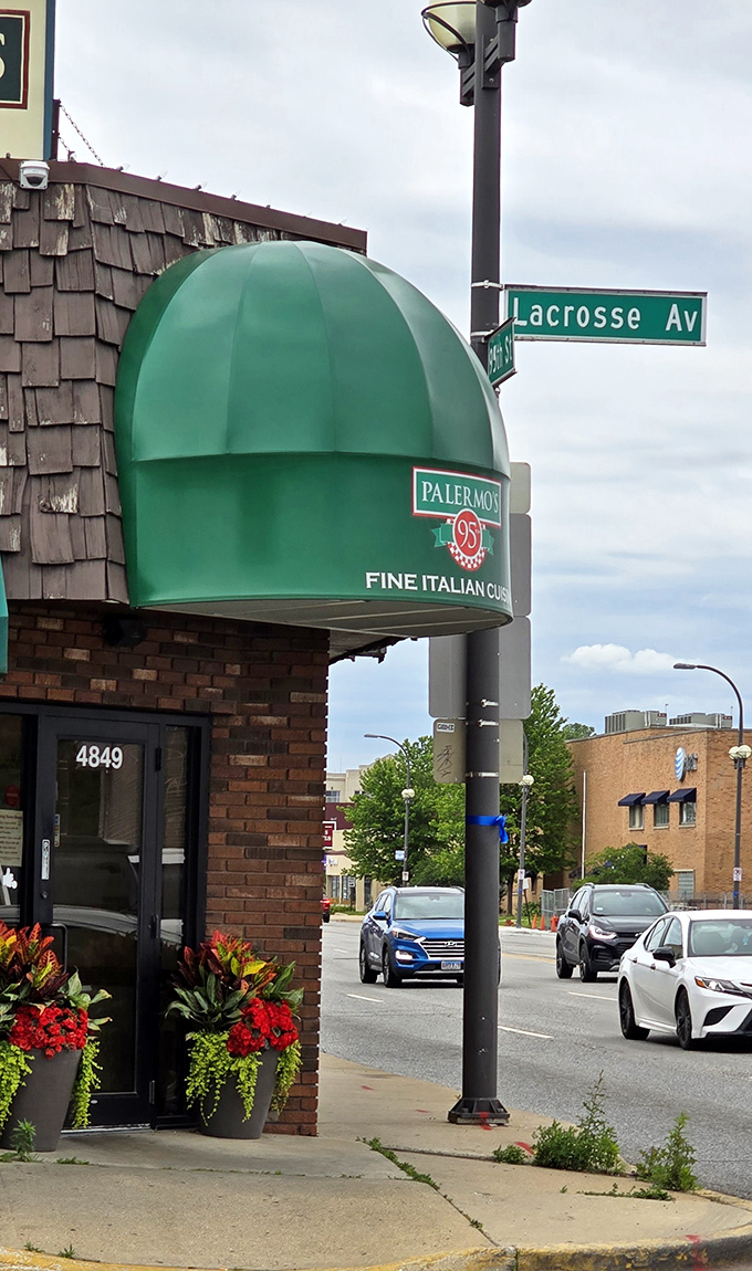 That iconic green awning at Palermo's 95th isn't just a landmark—it's a beacon of hope for hungry souls seeking pizza salvation in Oak Lawn.