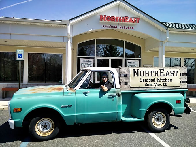 That vintage turquoise pickup isn't just for show—it's the perfect coastal calling card for Ocean View's seafood sanctuary.