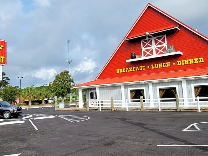 The iconic red barn roof isn't just architectural showmanship—it's a beacon of breakfast hope standing proud against the South Carolina sky.
