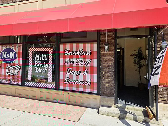 That iconic red awning isn't just a sunshade—it's a beacon of breakfast hope for hungry travelers navigating downtown Logan's brick-lined streets.