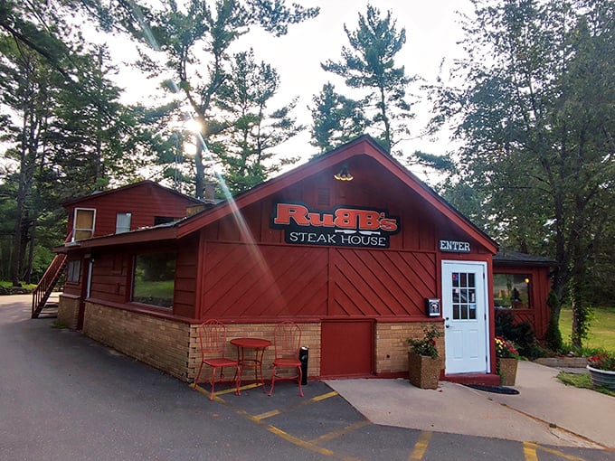 Nestled among towering pines, Rubb's rustic red exterior promises the kind of authentic Wisconsin dining experience that makes you forget about your diet resolutions.