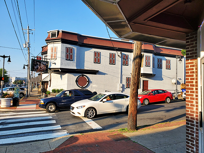 The iconic red WALTERS sign beckons hungry carnivores like a lighthouse guiding ships to safe harbor. Dinner awaits!