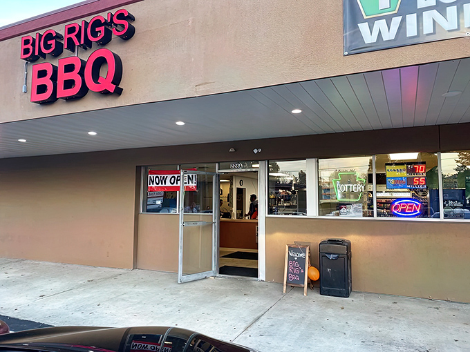 The bright red sign of Big Rig's BBQ stands out like a beacon of hope for hungry travelers. No-frills exterior, all thrills inside.