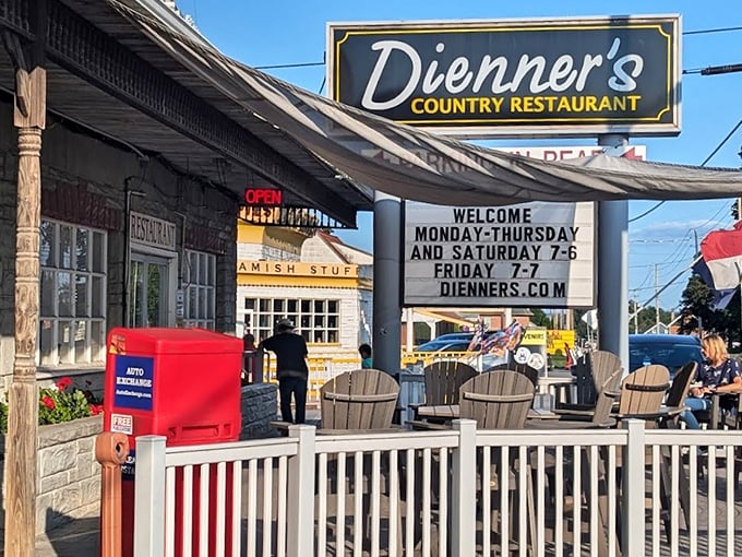 The unassuming stone exterior of Dienner's Country Restaurant hides culinary treasures within. No neon, no gimmicks—just a white railing leading to authentic Pennsylvania Dutch goodness.
