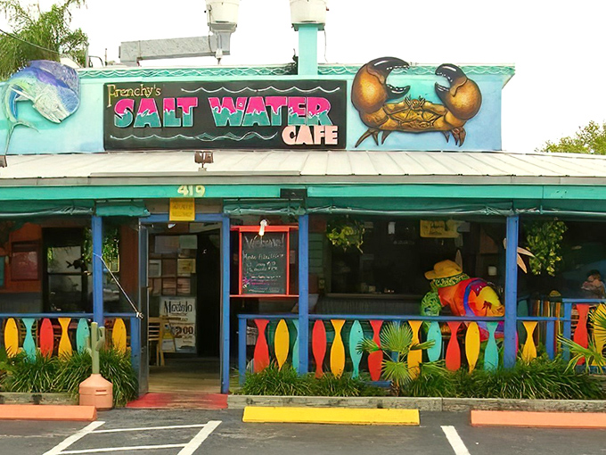 The technicolor dreamcoat of seafood shacks! Frenchy's exterior bursts with Caribbean flair, promising a Florida experience that's anything but beige.