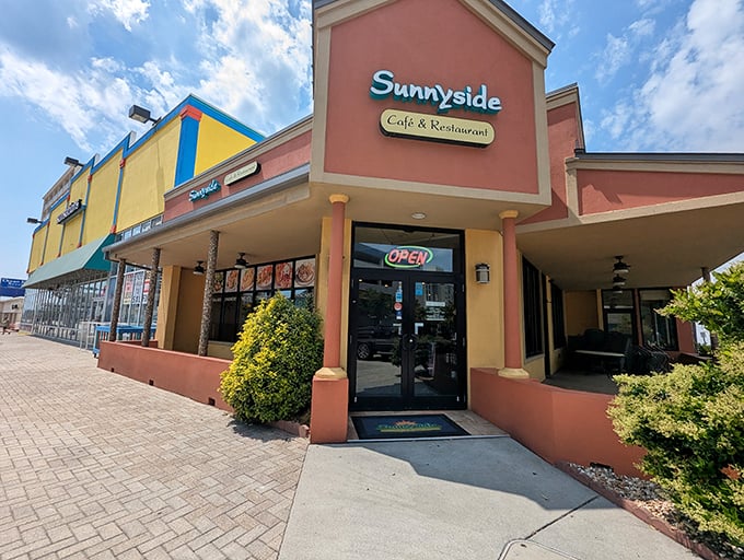 The coral and yellow exterior of Sunnyside Cafe stands like a beacon of breakfast hope among Virginia Beach's commercial landscape – unassuming yet irresistible.
