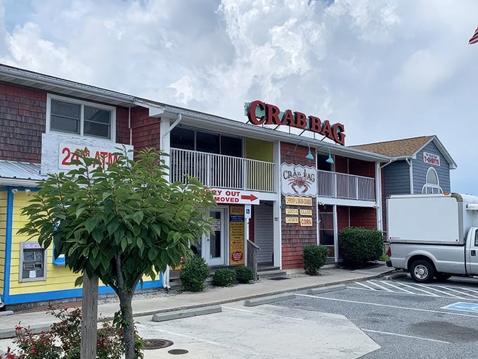 The colorful exterior of Crab Bag stands like a seafood beacon on Ocean City's Coastal Highway, promising treasures of the Chesapeake within.