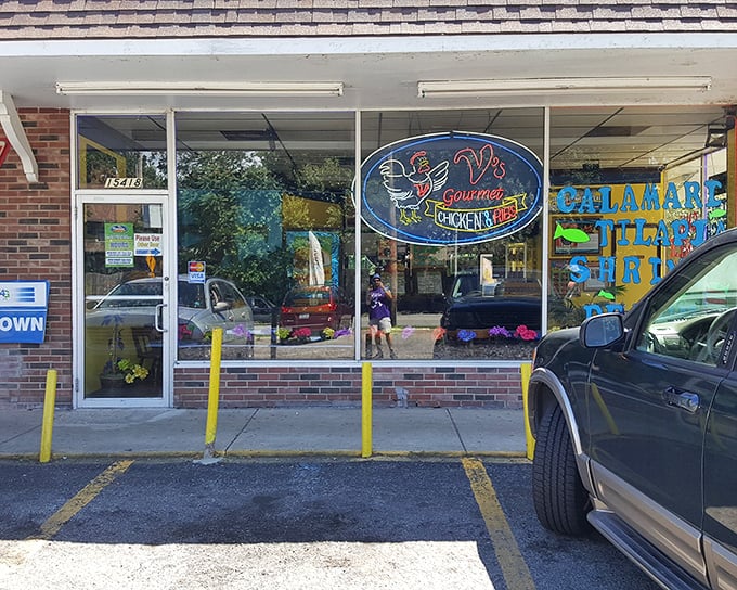 The unassuming storefront of V's Gourmet Chicken might not stop traffic, but trust me—your taste buds will slam on the brakes once you're inside.